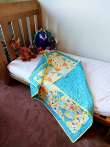 "Peter Rabbit kaleidoscope" handmade cot quilt - The Peacock Lotus